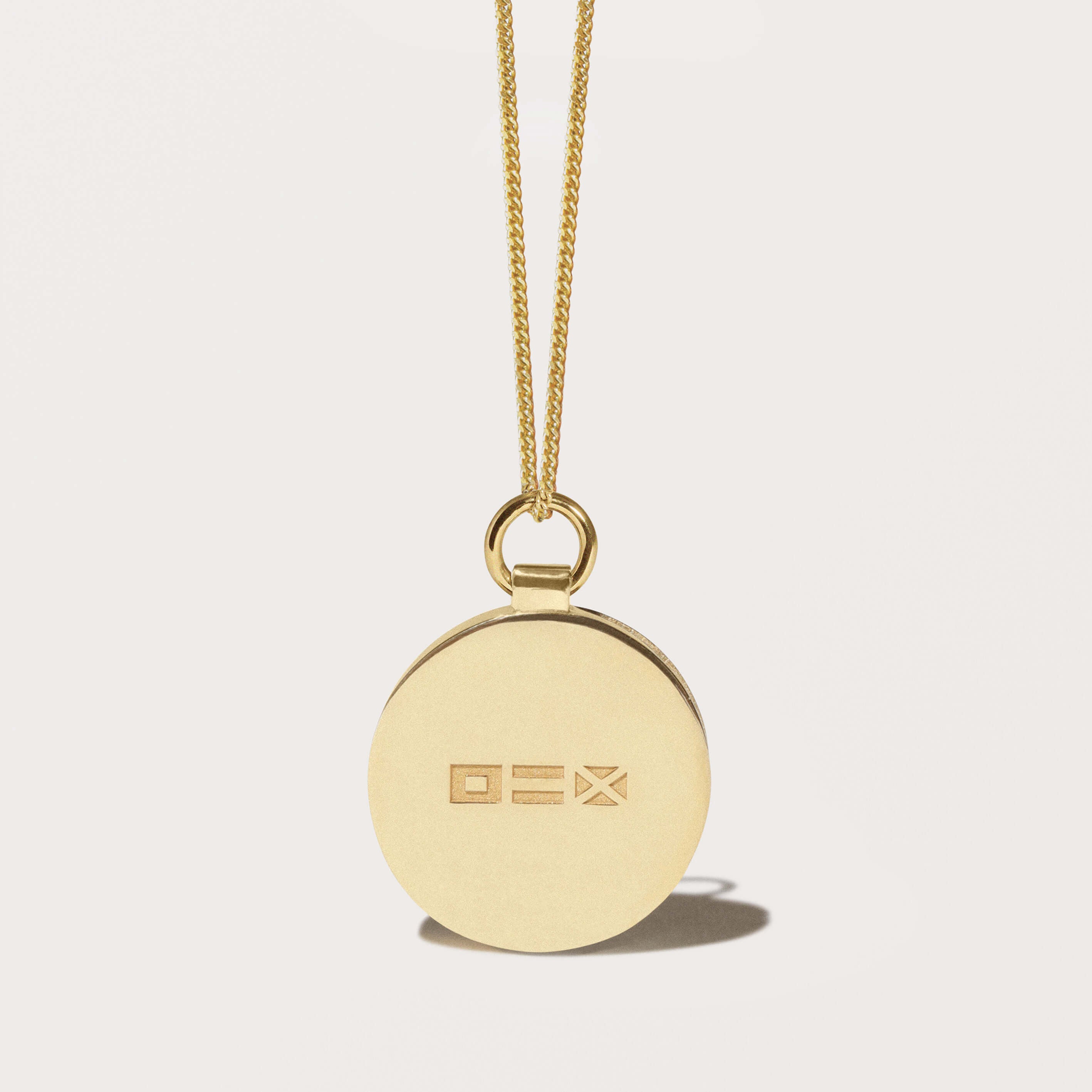 LARGE GOLD AND SILVER ECLIPSE LOCKET – Ferian